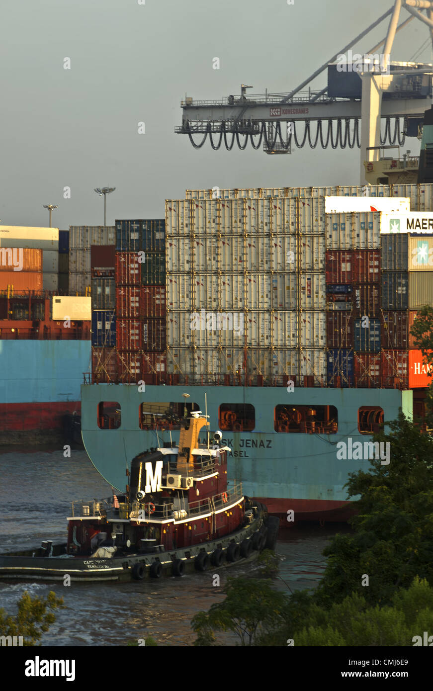 July 30, 2010 - Savannah, Ga, USA - A container ship is escorted by a ...
