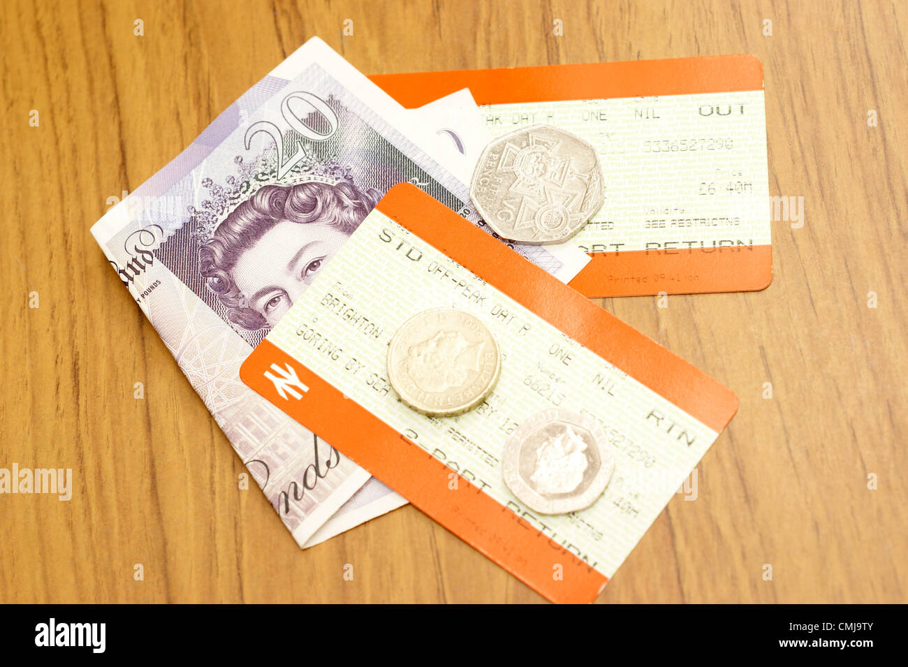 Railway train tickets & money Stock Photo - Alamy