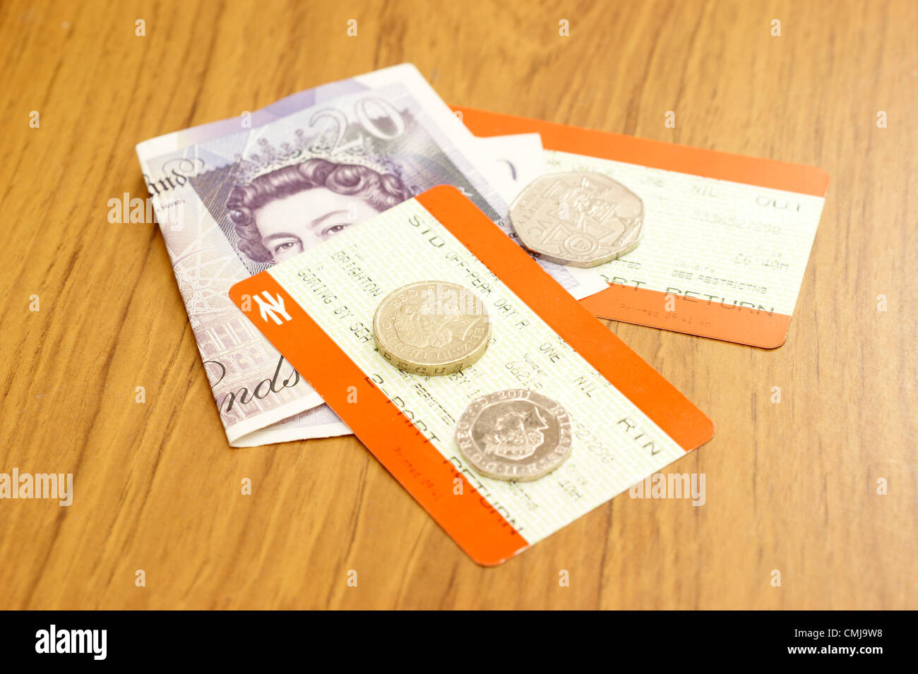 Railway train tickets & money Stock Photo - Alamy