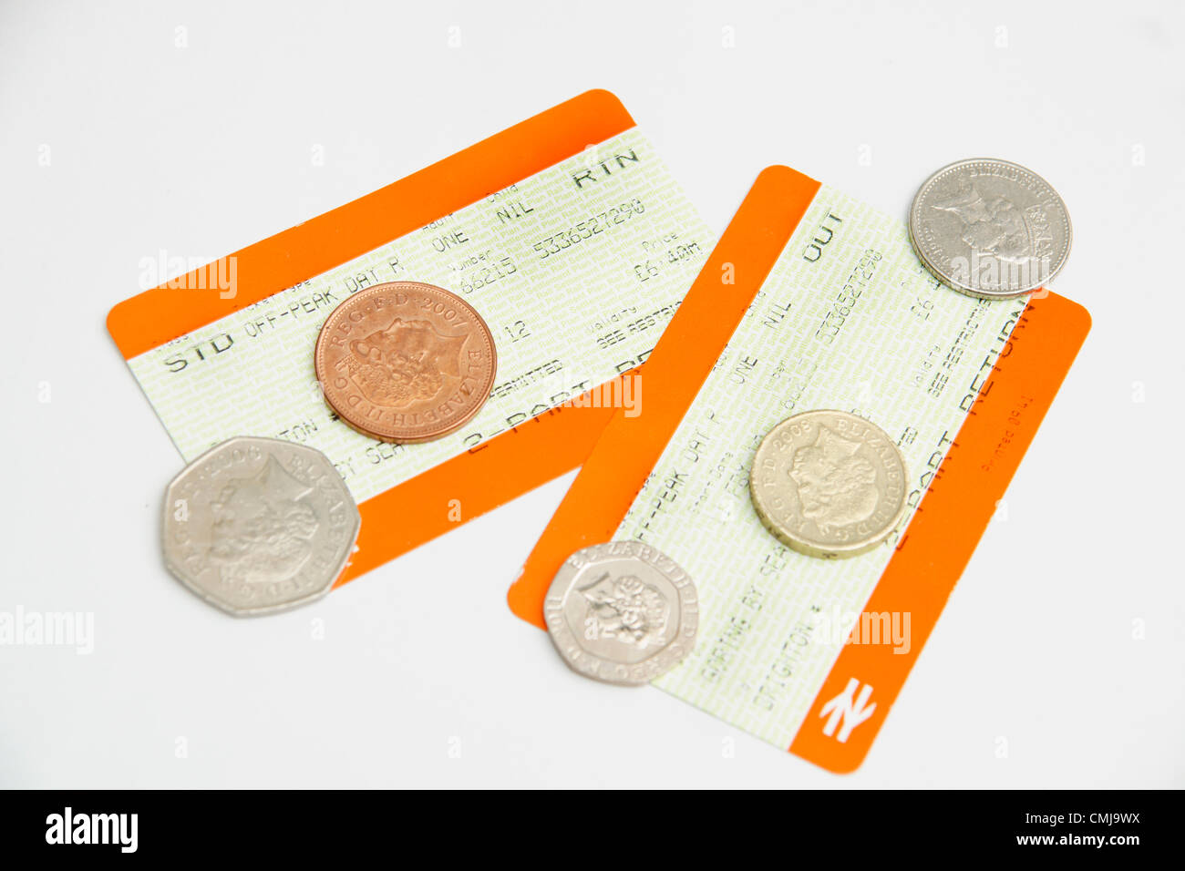 Railway train tickets & money Stock Photo - Alamy