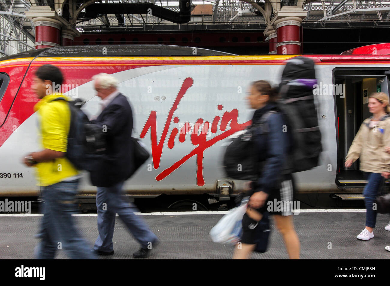 Passengers alighting from a Virgin Train service in Liverpool, UK on ...