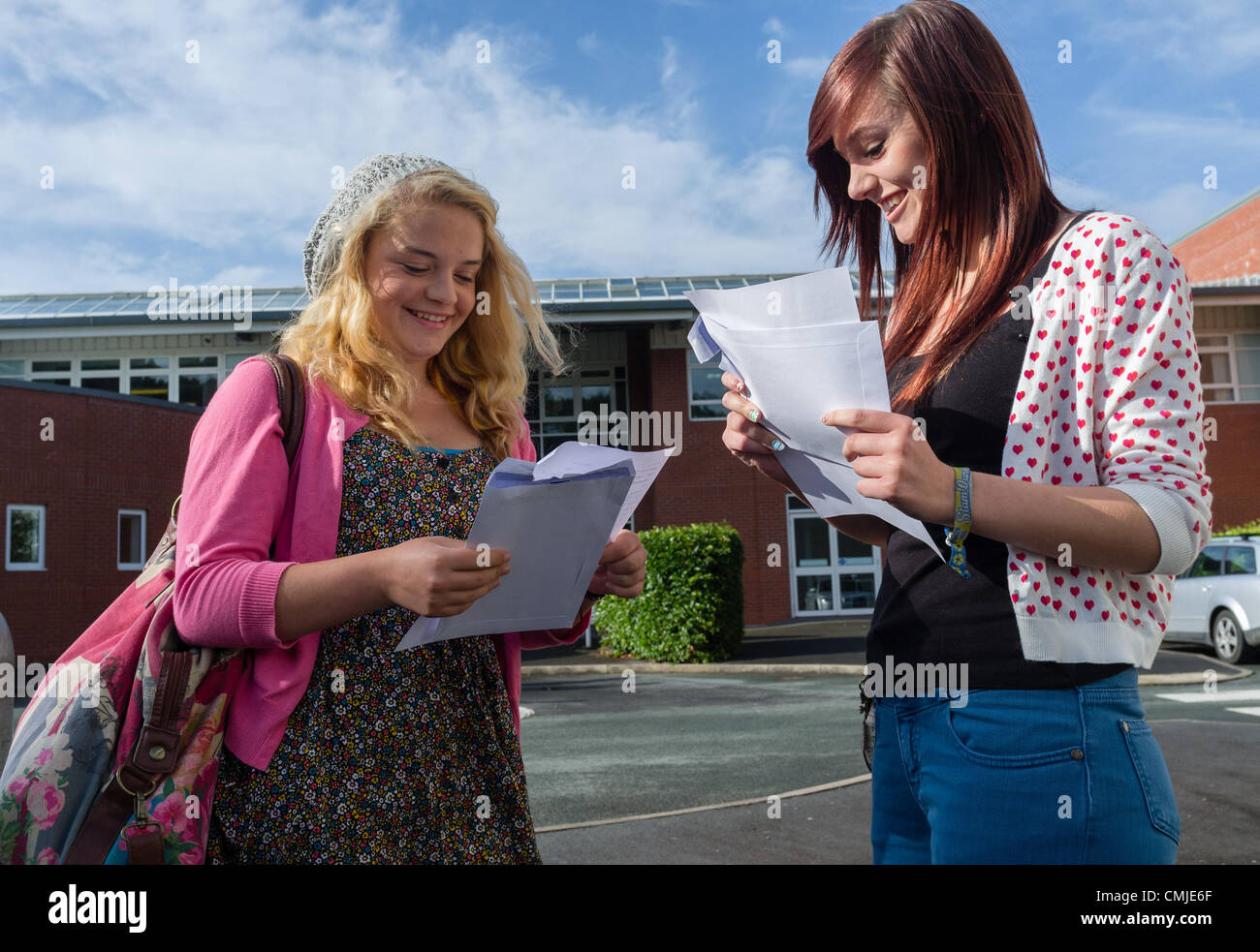16th Aug 2012. Two teenage girls open their A Level and AS level exam ...
