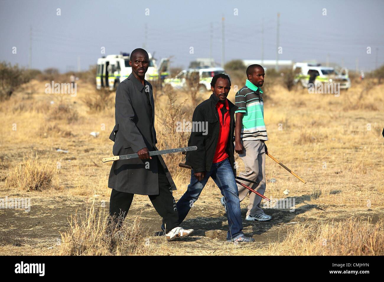16th Aug 2012. RUSTENBURG, SOUTH AFRICA: Striking mine workers meet to ...