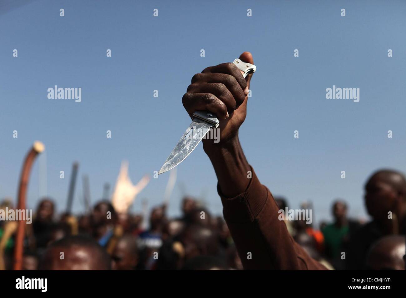 16th Aug 2012. RUSTENBURG, SOUTH AFRICA: A striking mine worker ...