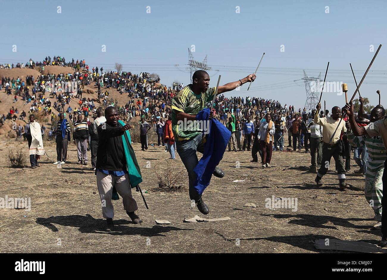 16th Aug 2012. RUSTENBURG, SOUTH AFRICA: Striking mine workers meet to ...