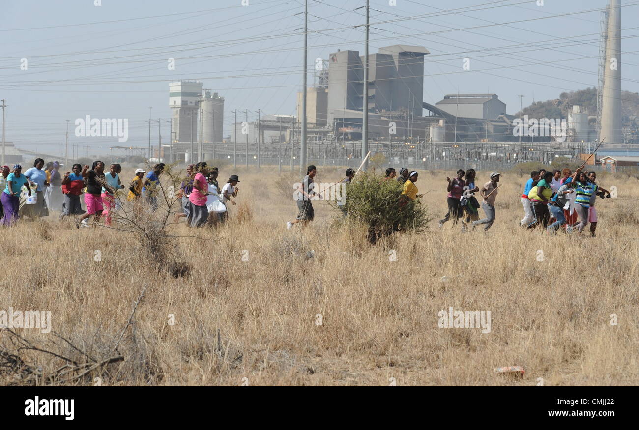 16th Aug 2012. RUSTENBURG, SOUTH AFRICA: Women join the mine workers as ...