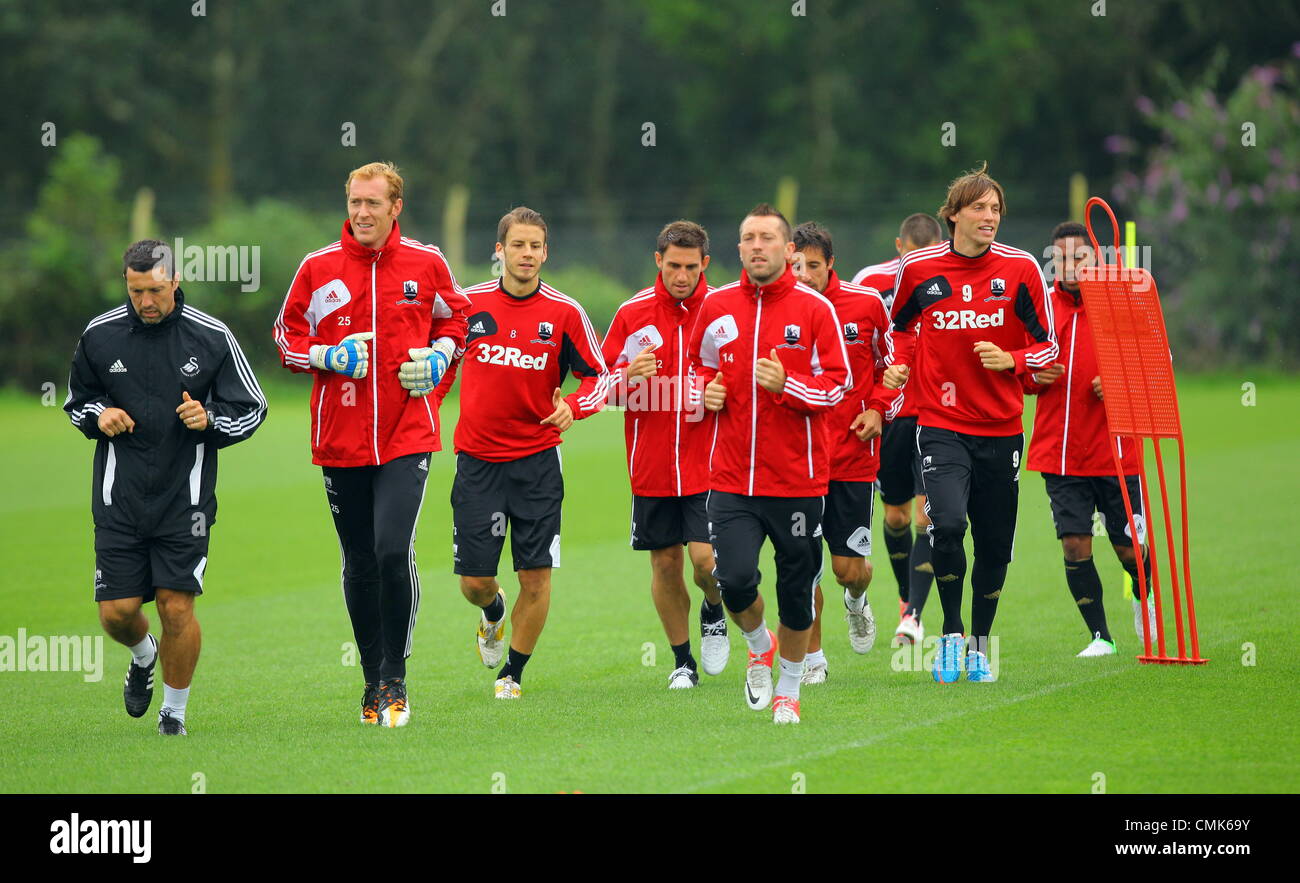 Pictured L-R: Coach Ryland Morgans, Gerhard Tremmel, Andrea Orlandi ...