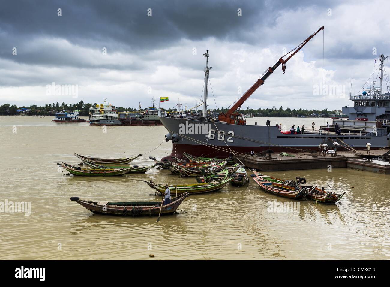 June 13, 2013 - Yangon, Union of Myanmar - Lighters and tenders gather ...