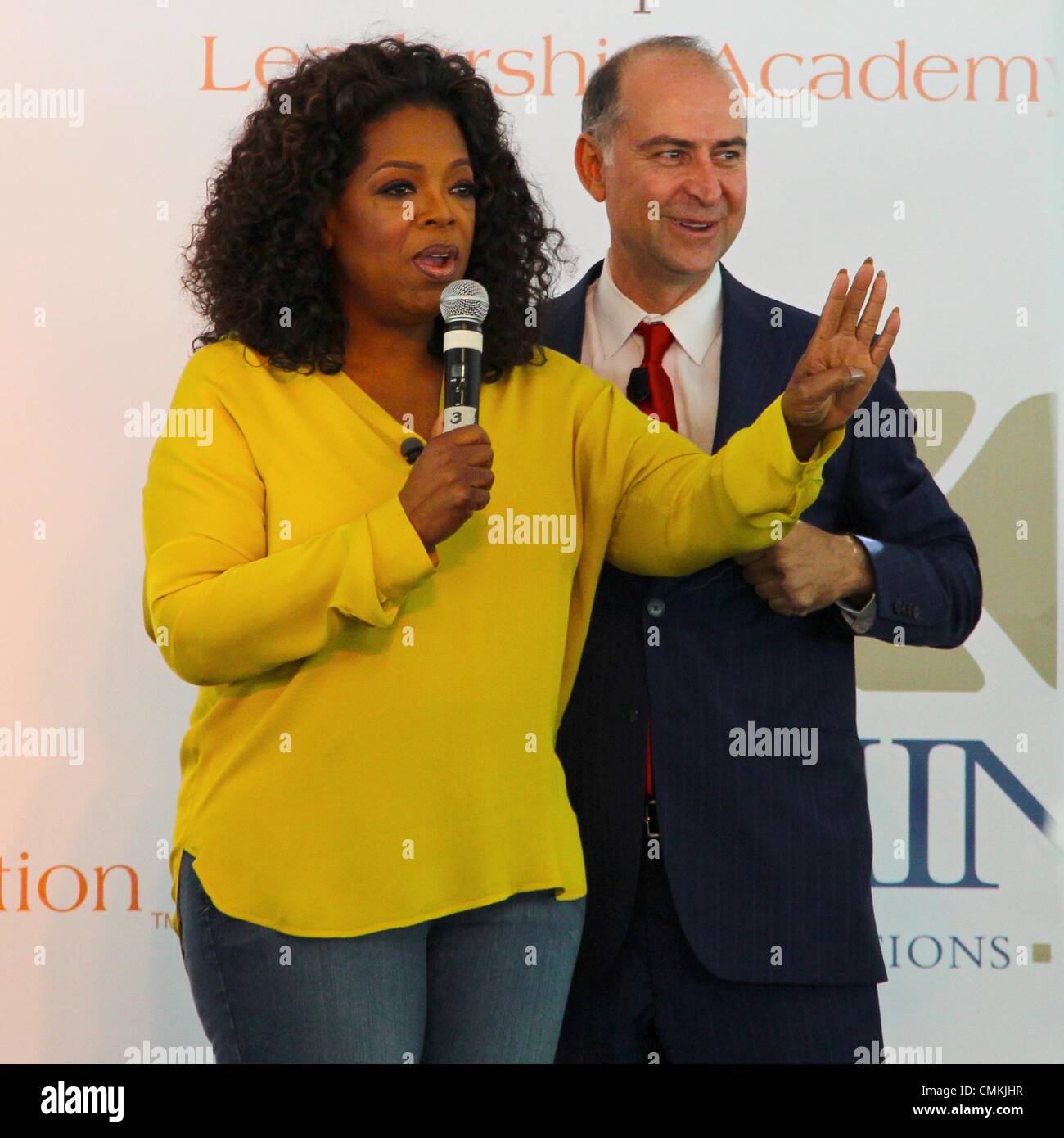 Oprah with Frank Kaminski, president of Kaminski Auctions, tryng to get ...