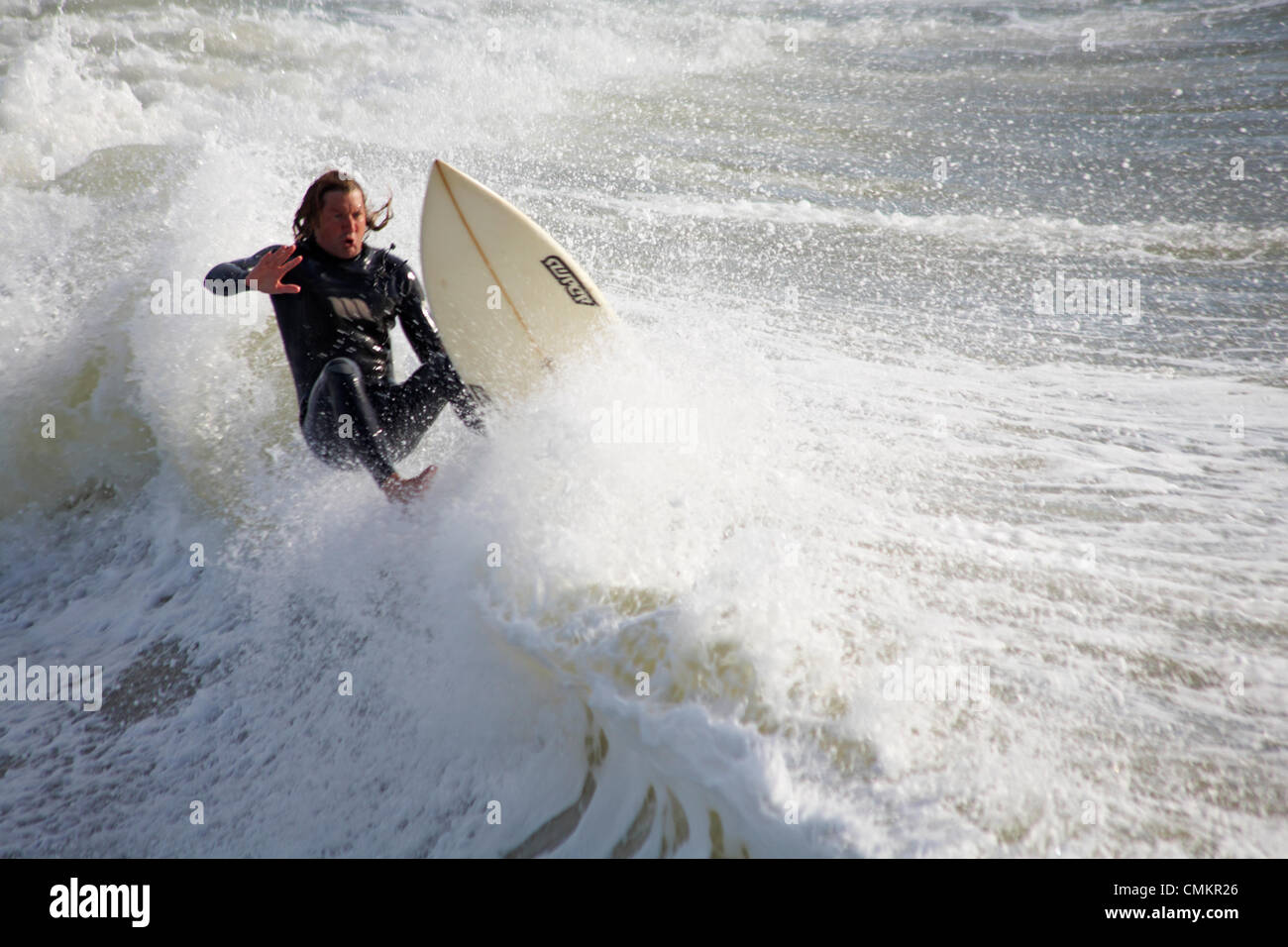 Bournemouth, UK. 3rd Nov, 2013. Surfers surfer making the most of the ...