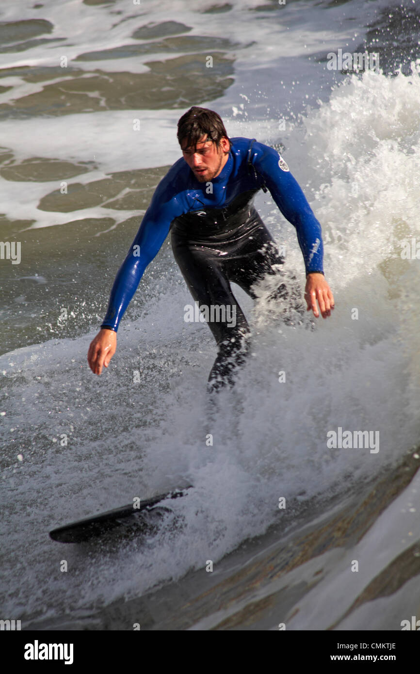 Bournemouth, Dorset UK. 3rd Nov, 2013. Surfers surfer making the most ...