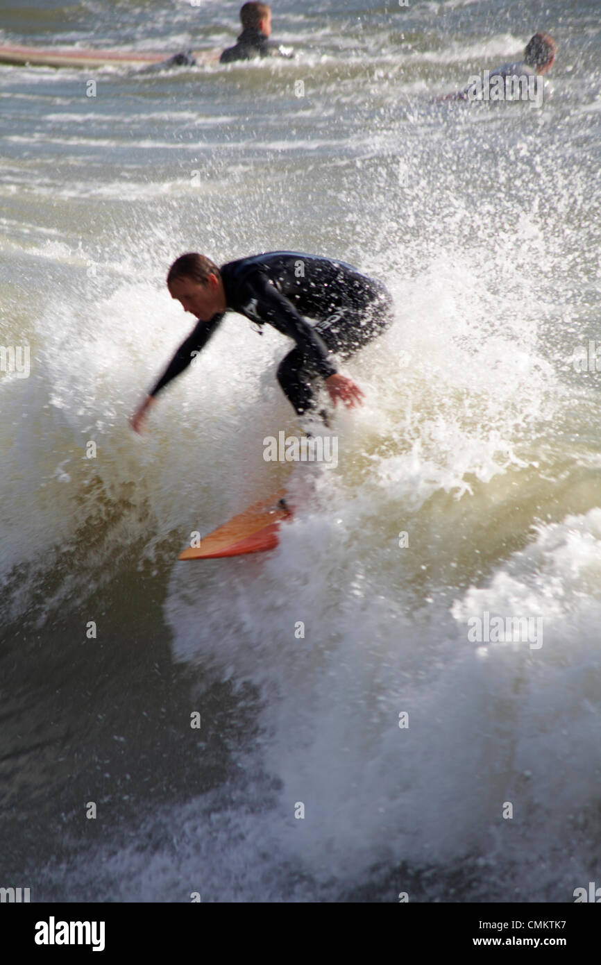 Bournemouth, Dorset UK. 3rd Nov, 2013. Surfers surfer making the most ...
