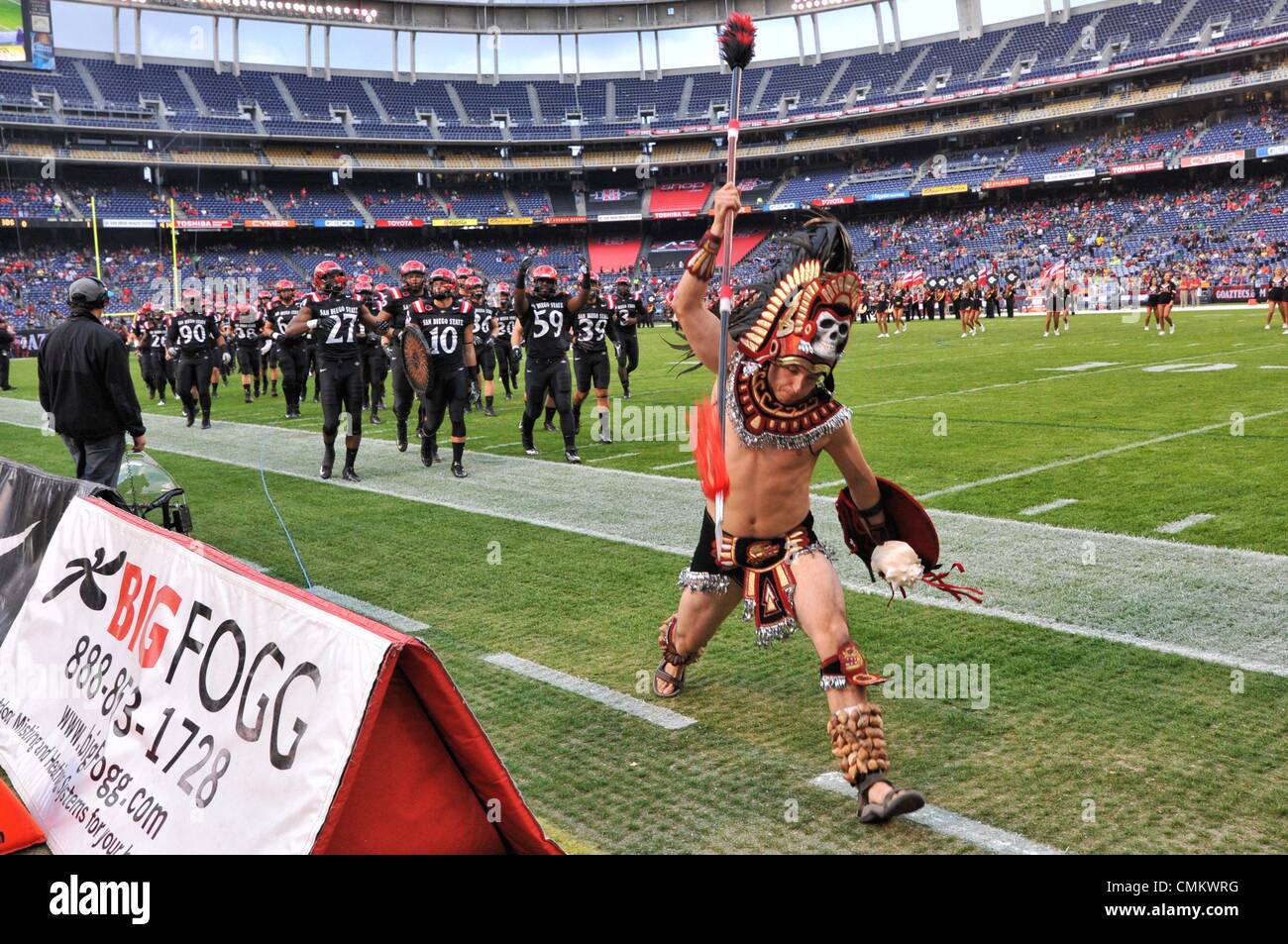San Diego, CA, USA. 2nd Nov, 2013. Aztecs mascot leads the team on. The ...