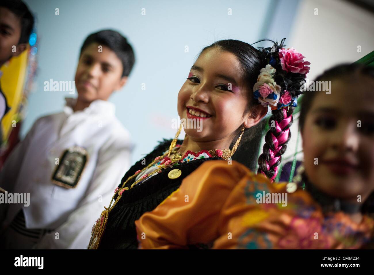 Santiago Del Chile, Chile. 3rd Nov, 2013. Laila, aged 6, waiting for ...