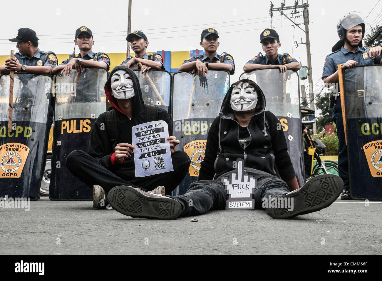 Manila, Philippines. 5th Nov, 2013. Anonymous Philippines members rest ...