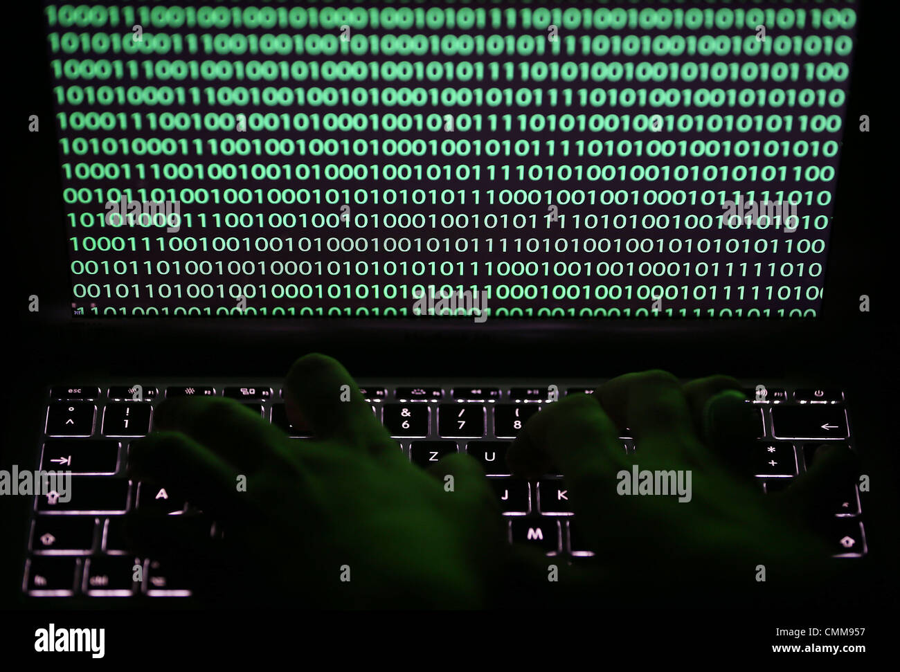 An illustration shows columns of binary codes on a computer screen in ...
