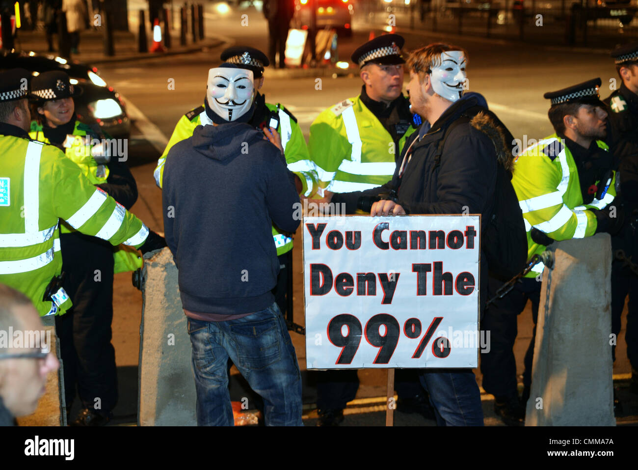 London, UK. 5th Nov 2013. Hundreds of Anonymous protest at the front of ...