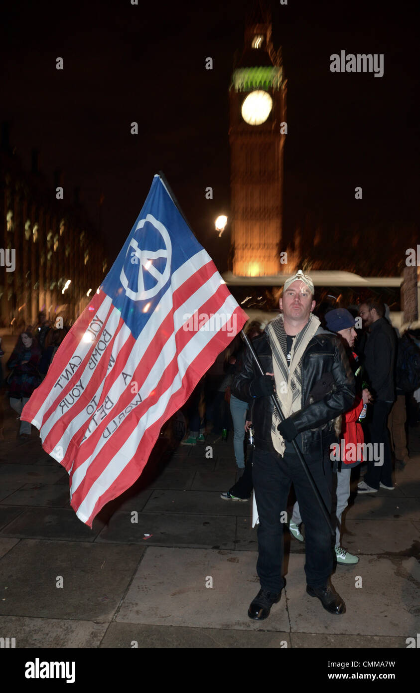 London, UK. 5th Nov 2013. Hundreds of Anonymous protest at the front of ...