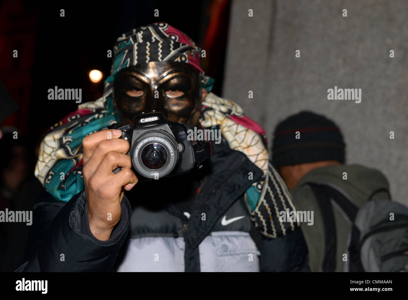 London, UK. 5th Nov 2013. Hundreds of Anonymous protest at the front of ...