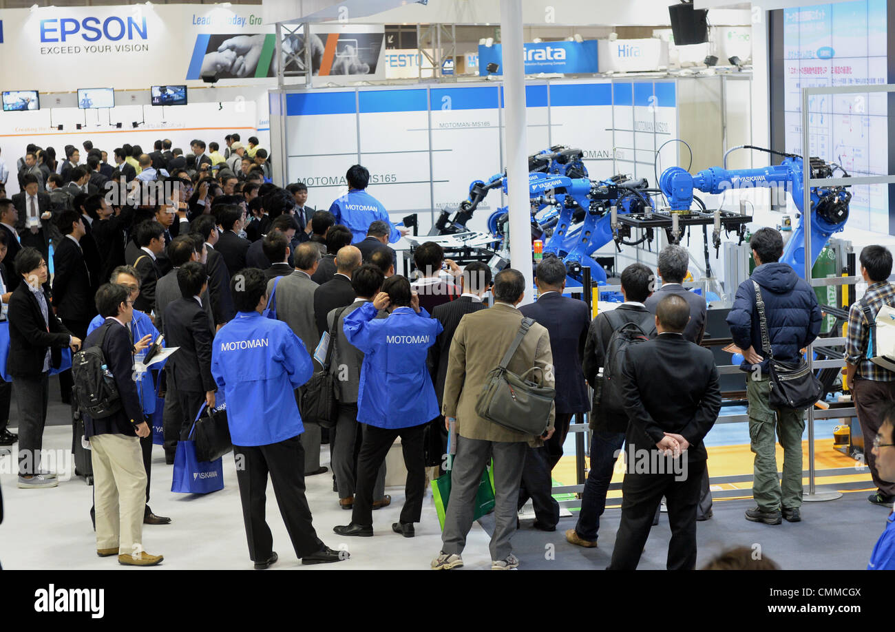 Tokyo, Japan. 6th Nov, 2013. Visitors mill around the booth of ...