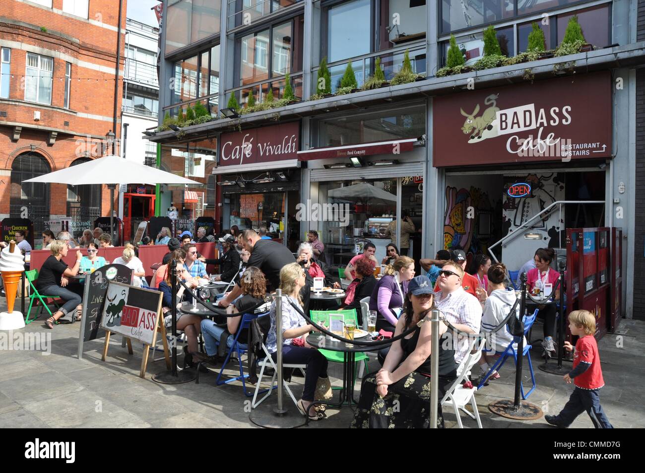 Visitors take a rest at Cafe Vivaldi and the Bad Ass Cafe at Temple Bar ...