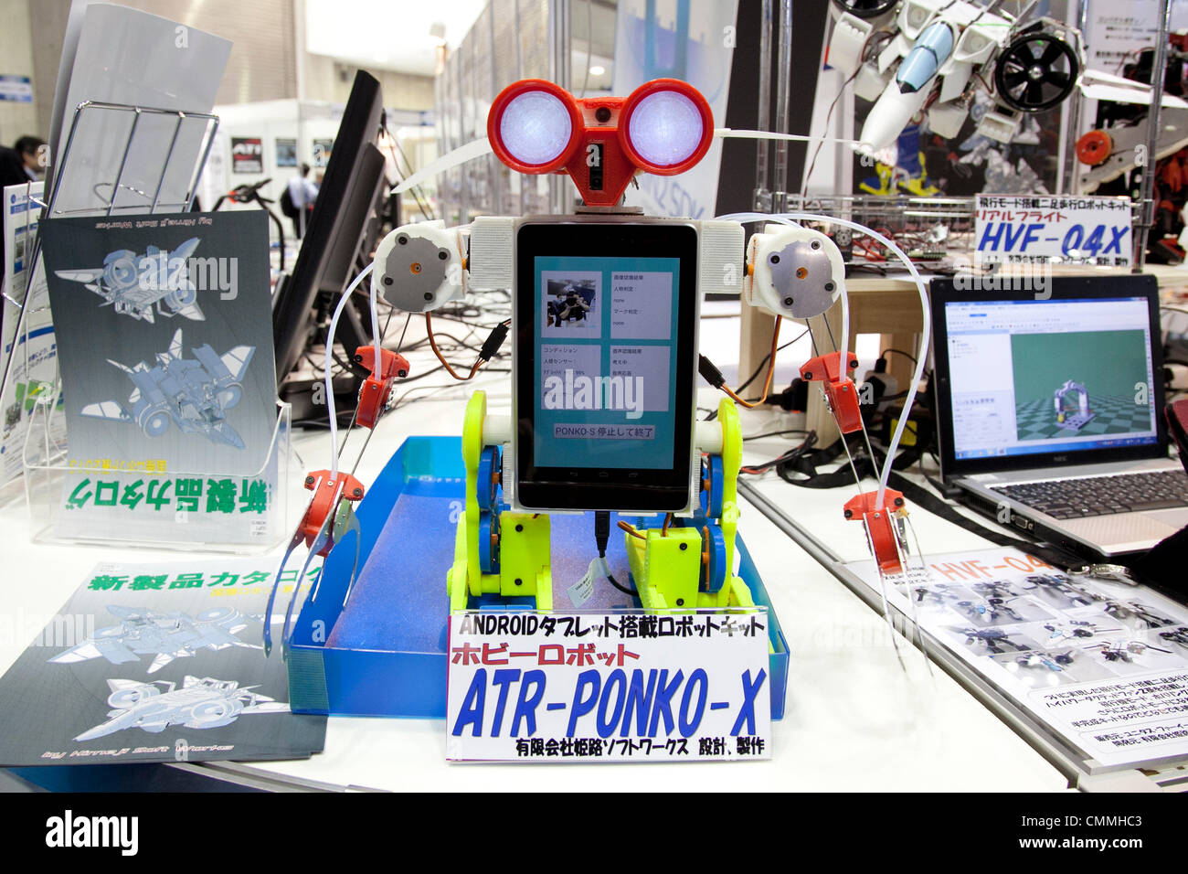 Tokyo, Japan. 6th Nov, 2013. The robot of ORIN "ATR-PONKO-X" works with ...