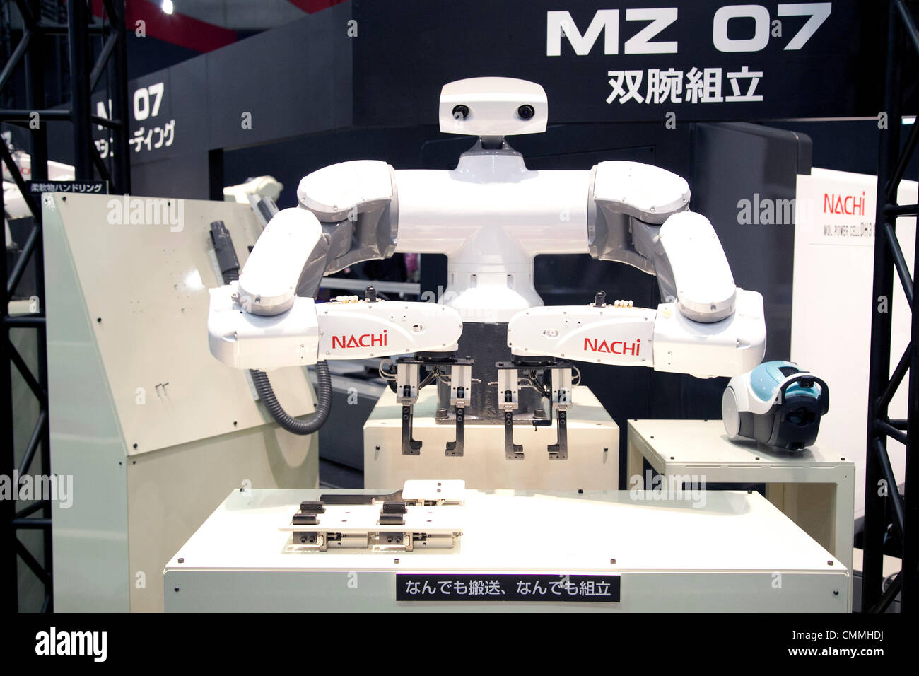 Tokyo, Japan. 6th Nov, 2013. NACHI "Dual Arm Robot" performs at the ...