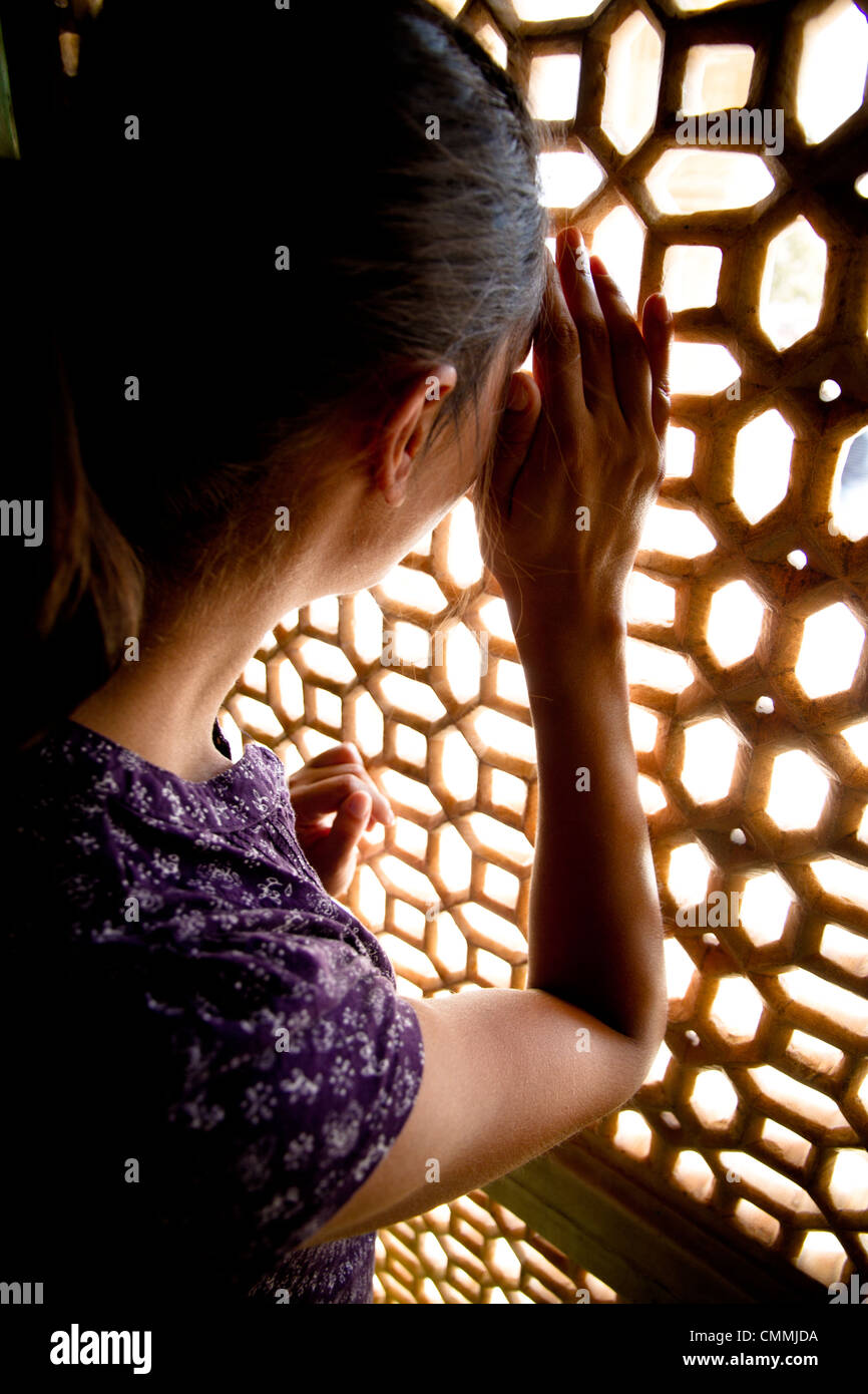 young woman on Window Stock Photo - Alamy
