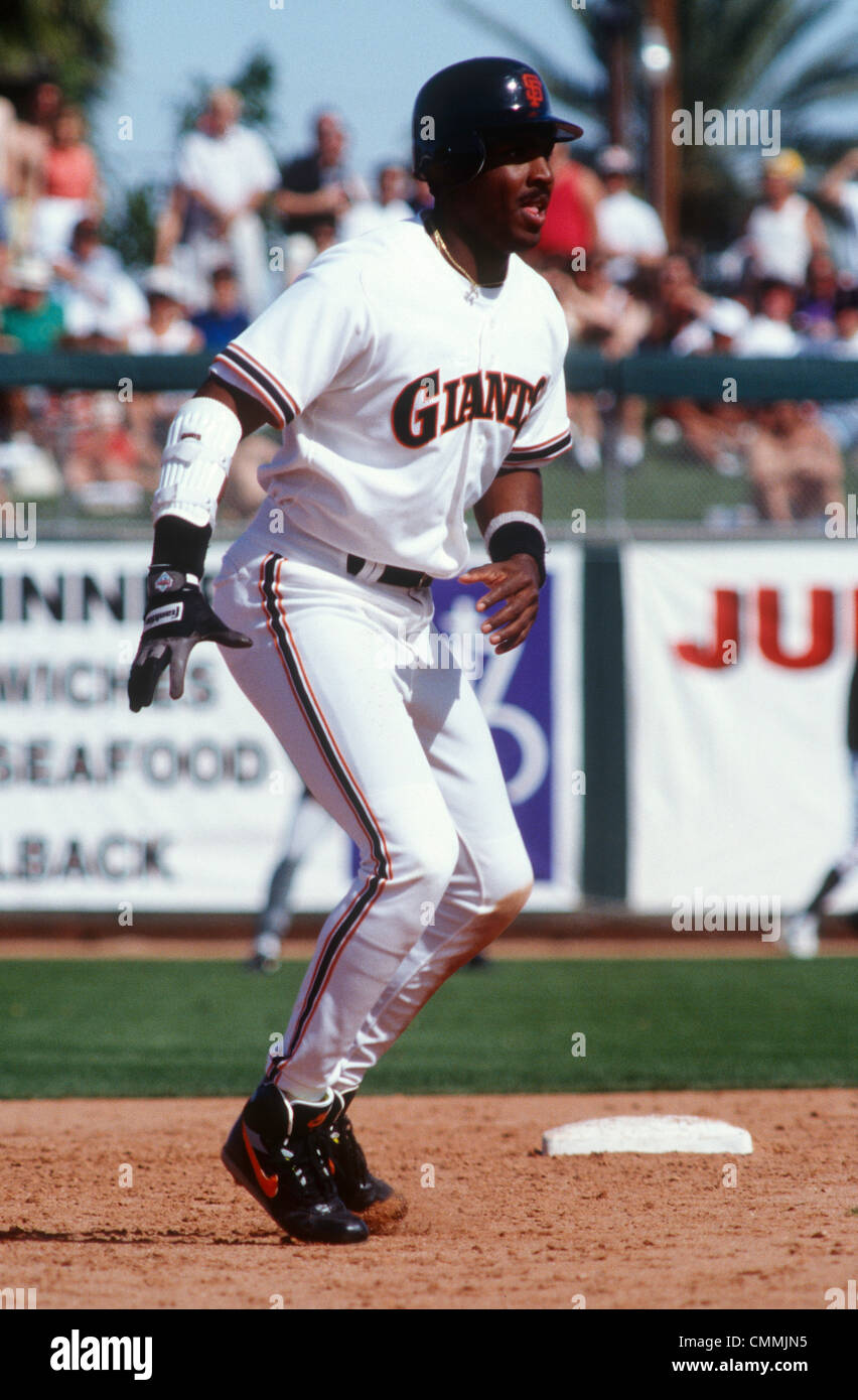 Barry Bonds takes a lead off second base during spring training in ...