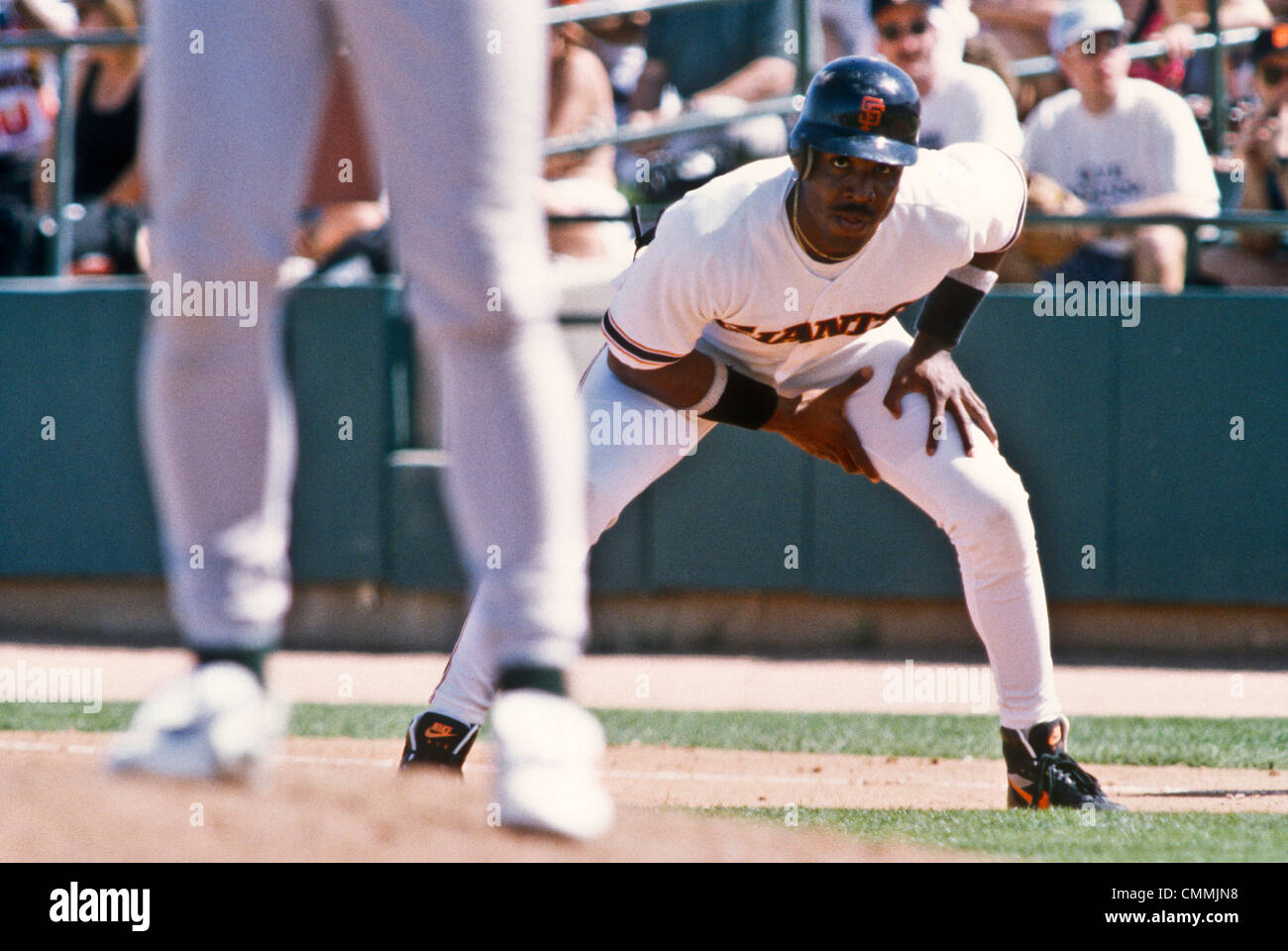 Barry Bonds takes a lead off first base during spring training in ...