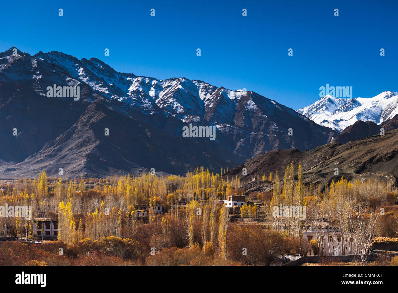 Autumn scene at the Stok village with the snow capped peak of Stok ...