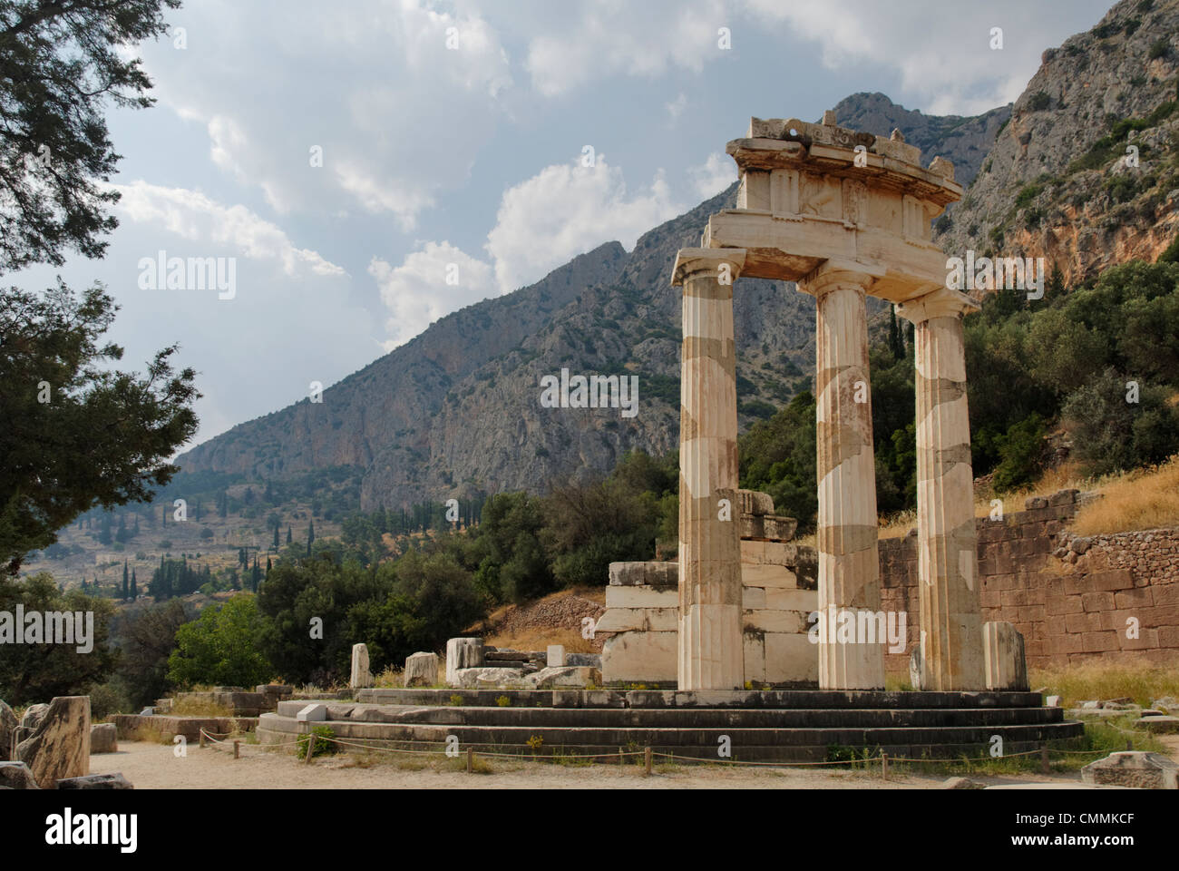 Delphi. Greece. View of the circular elegant Tholos with its three ...