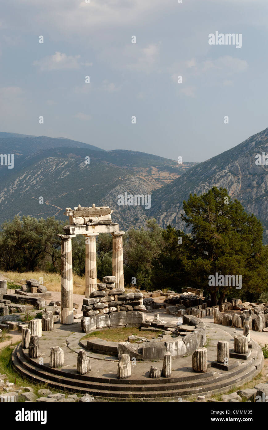 Delphi. Greece. View of the circular elegant Tholos with its three ...