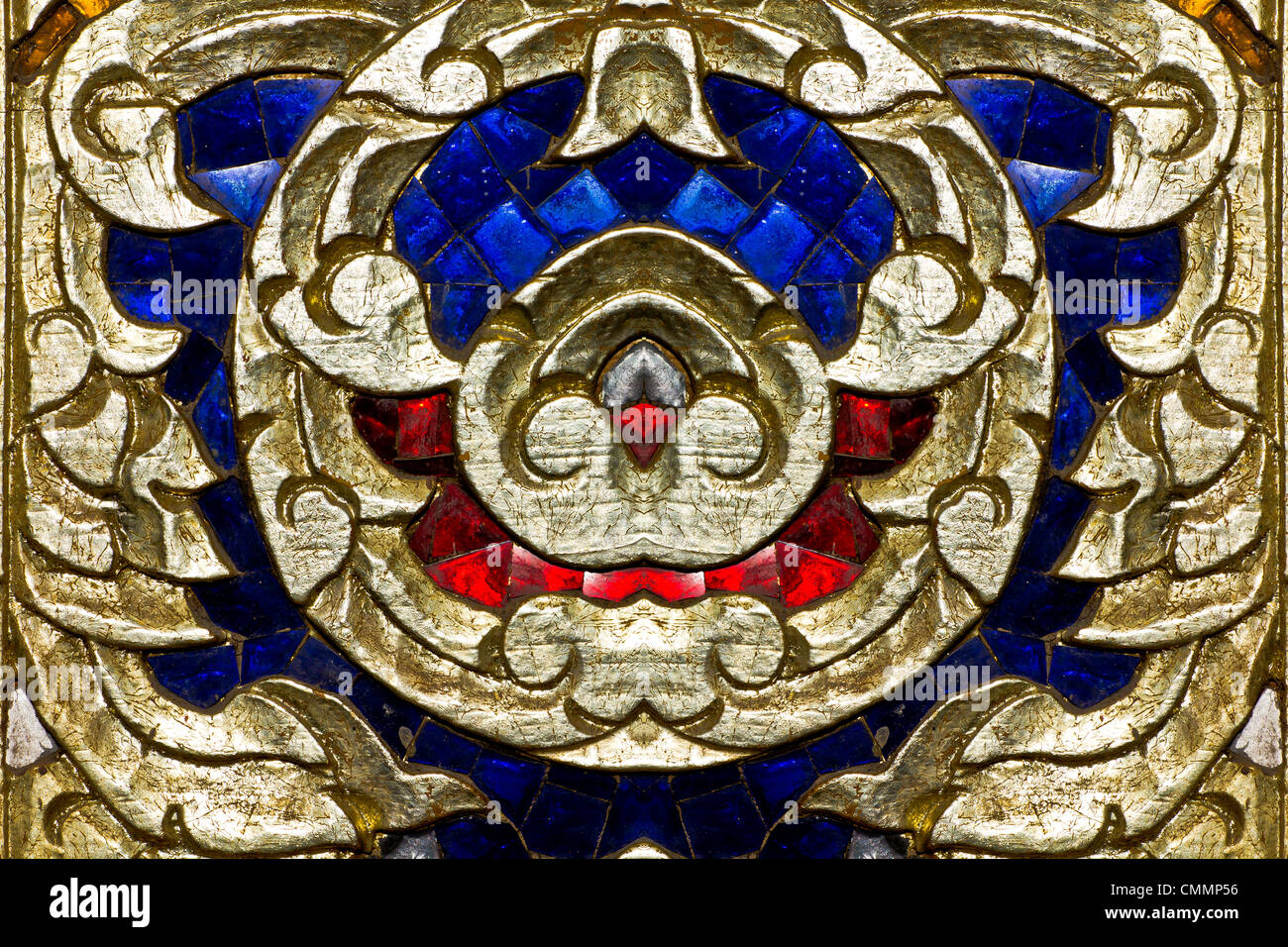 Native art carved on the wall in the temple Stock Photo - Alamy