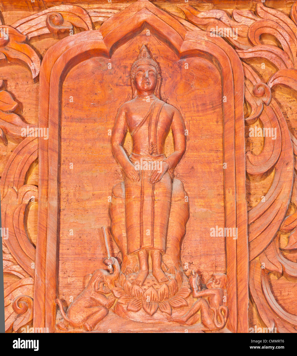 Native art carved on the wall in the temple Stock Photo - Alamy