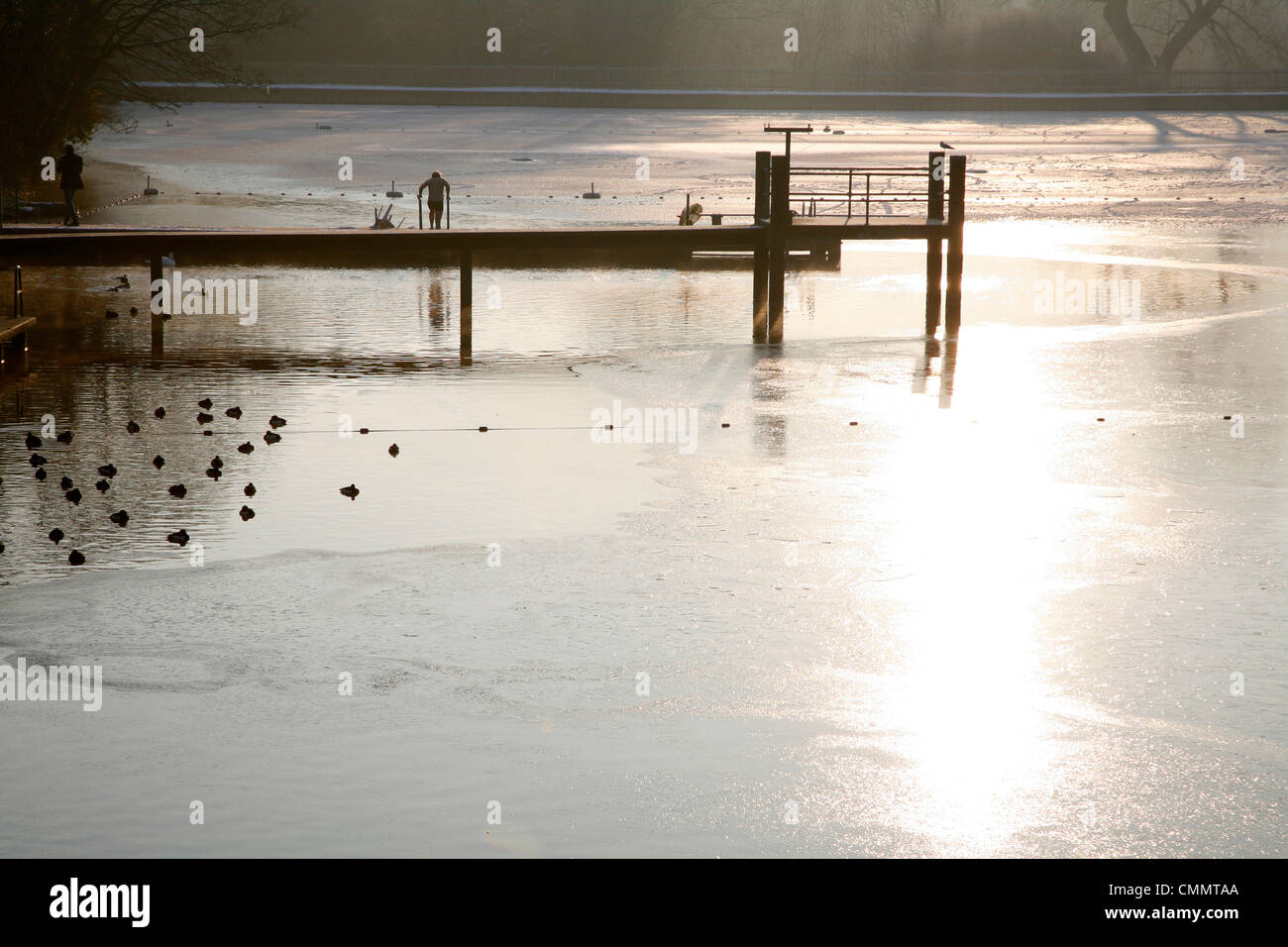 Swimmer entering an icebound Highgate Mens Bathing Pond, Hampstead ...