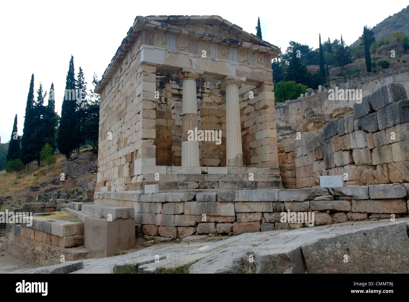 Delphi. Greece. View of the restored Treasury of the Athenians which is ...