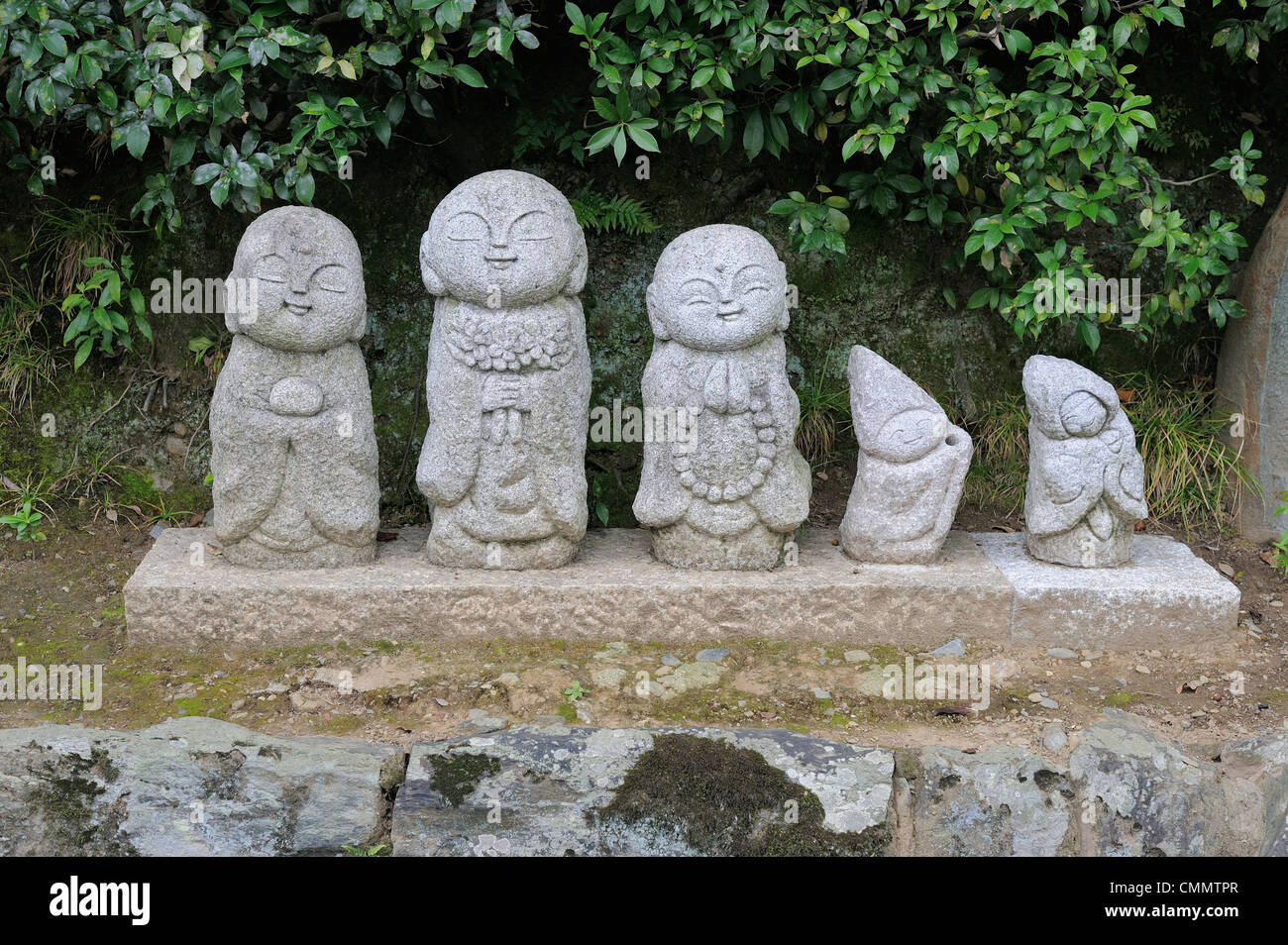 small smiling Buddhist monk statues in Arashiyama, Kyoto, Japan Stock ...