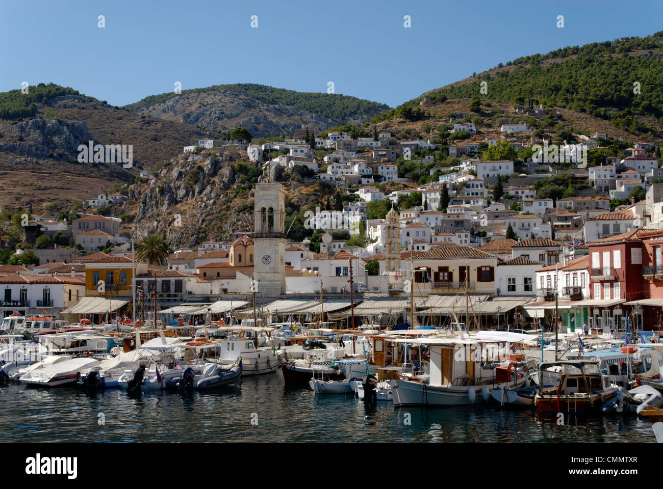 Hydra. Greece. Partial view of the bustling harbour and waterfront of ...