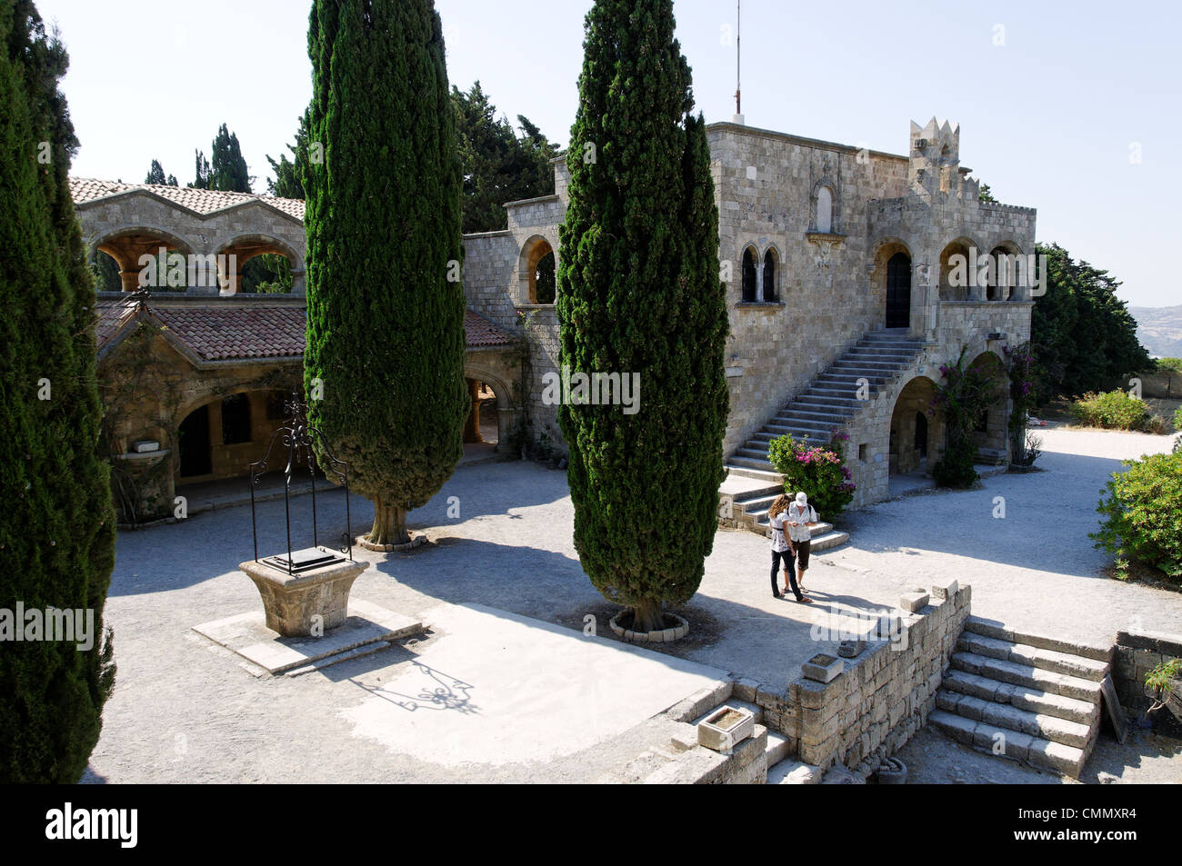 Rhodes. Greece. View of the 14th century monastery colonnaded courtyard ...
