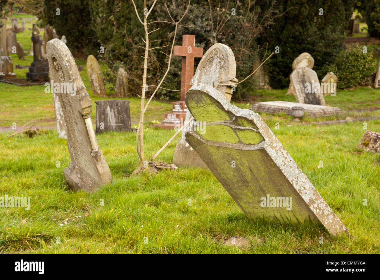 headstones,gravestones leaning and falling over in cemetery graveyard ...