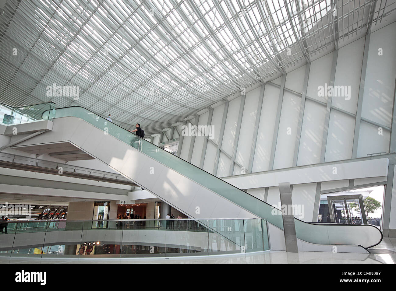 Escalator in the shopping mall Stock Photo - Alamy