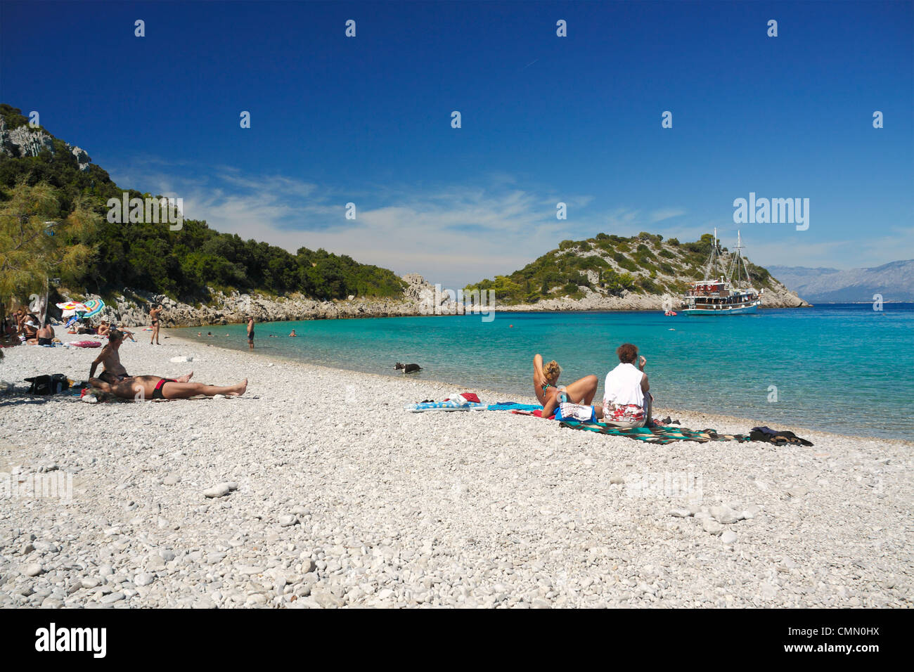 People resting on Divna beach, Peljesac peninsula, Croatia Stock Photo ...