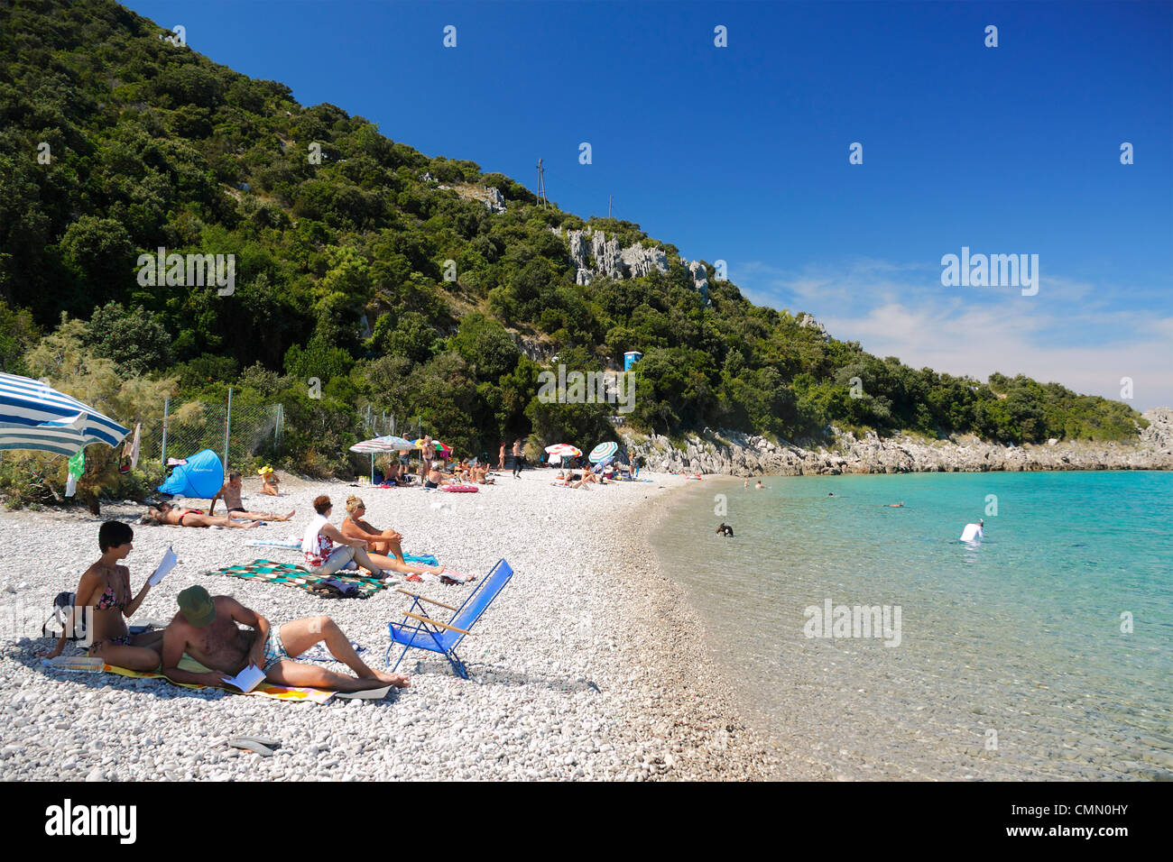 People resting on Divna beach, Peljesac peninsula, Croatia Stock Photo ...