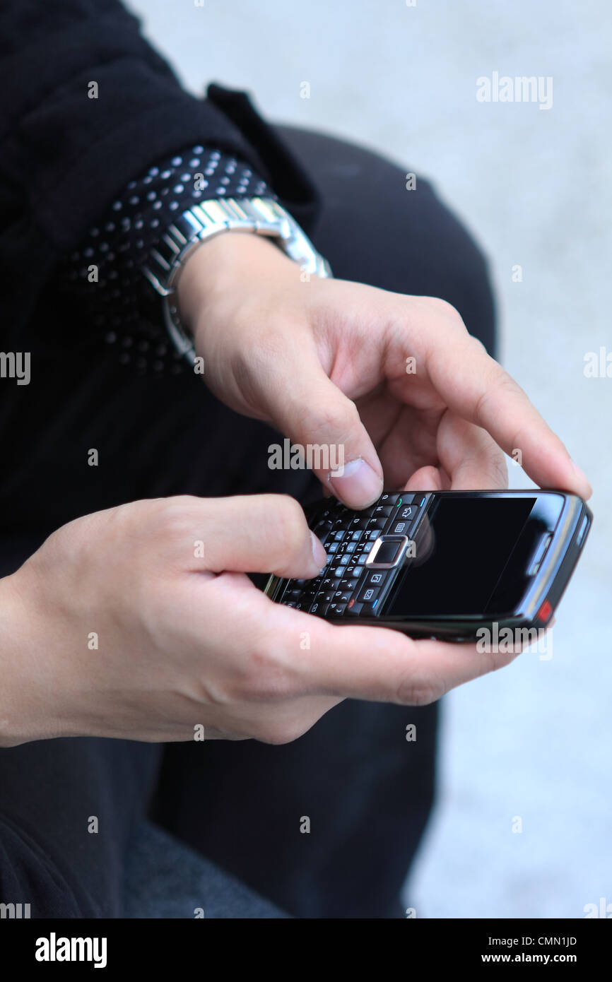 Mobile phone in man hand Stock Photo - Alamy