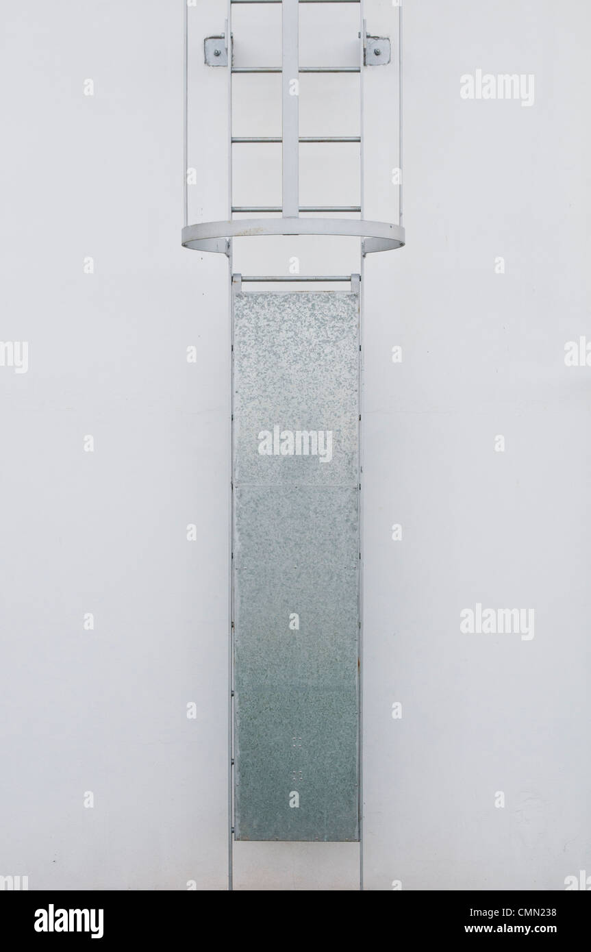 Metal access / escape ladder on a building Stock Photo - Alamy