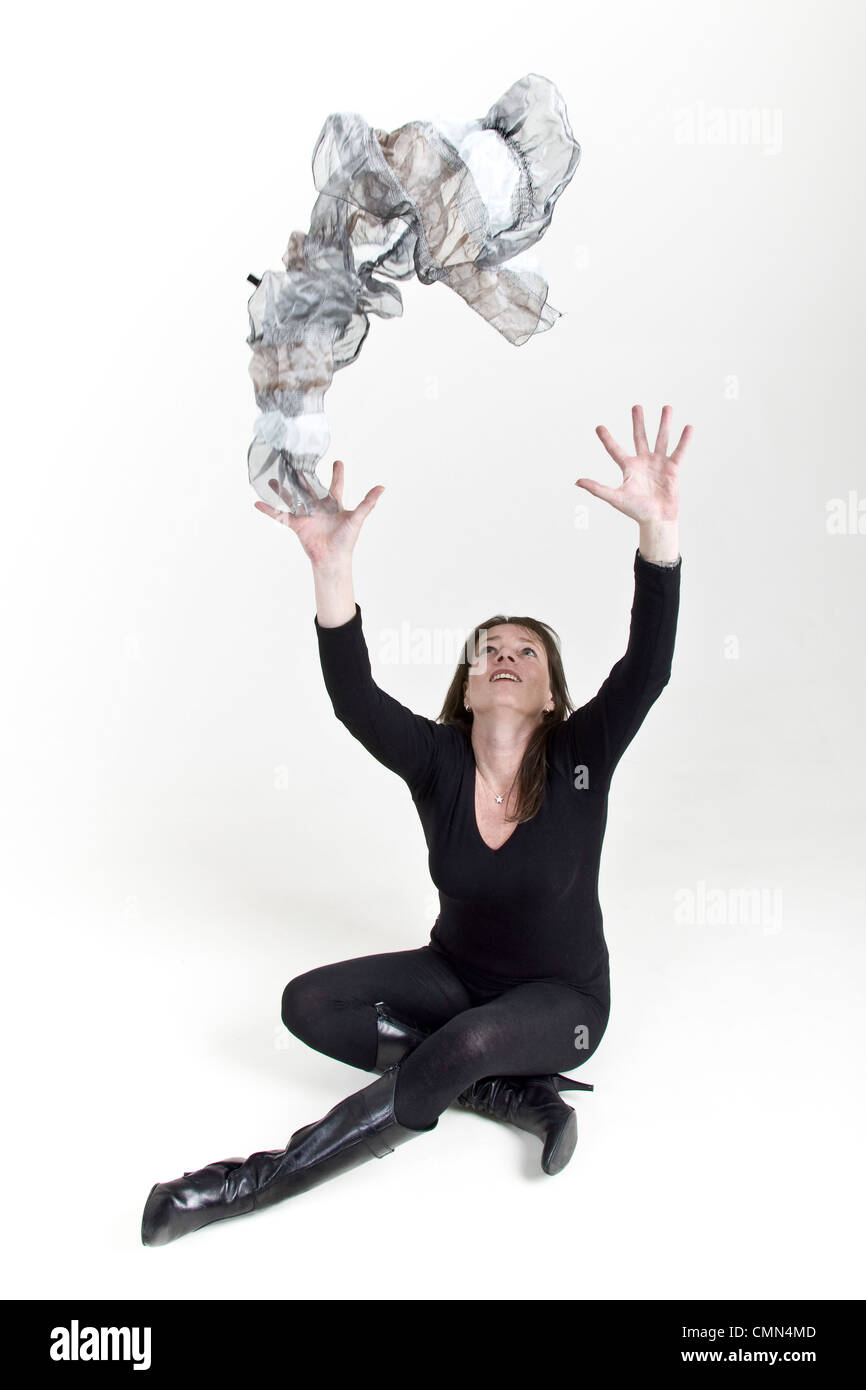 Woman and wind Stock Photo - Alamy