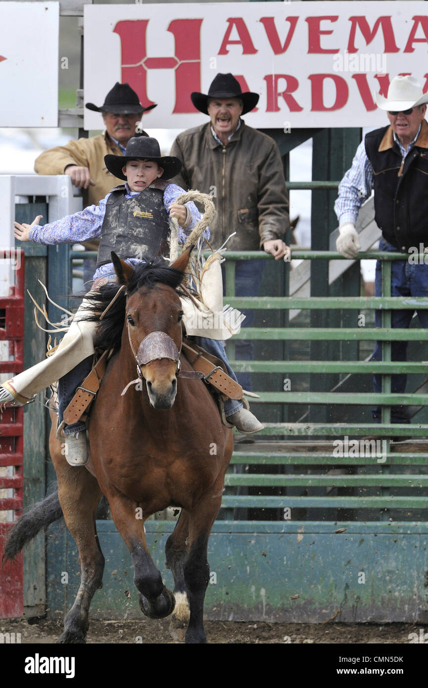 Teen boy riding horse hi-res stock photography and images - Alamy