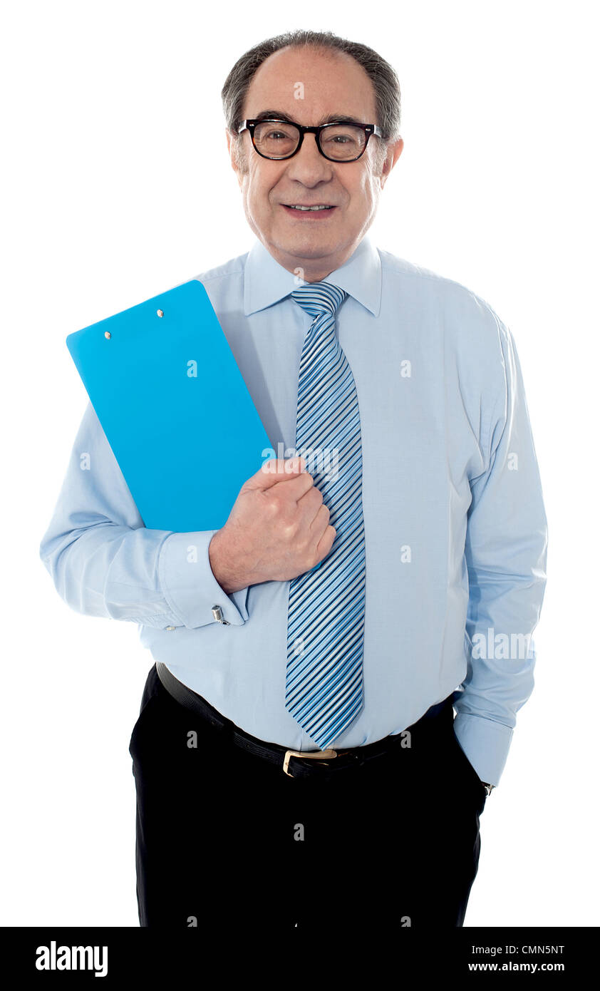 Corporate person holding document and smiling at camera Stock Photo - Alamy
