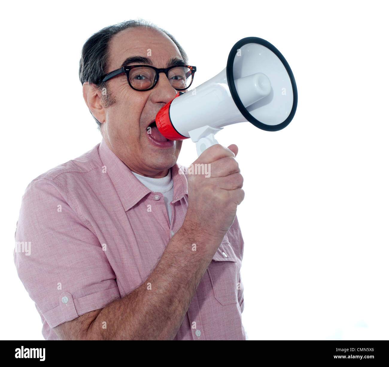 Senior male screaming loudly in a megaphone Stock Photo - Alamy